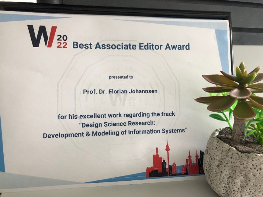 Best Associate Editor Award auf der Wirtschaftsinformatik-Konferenz 2022